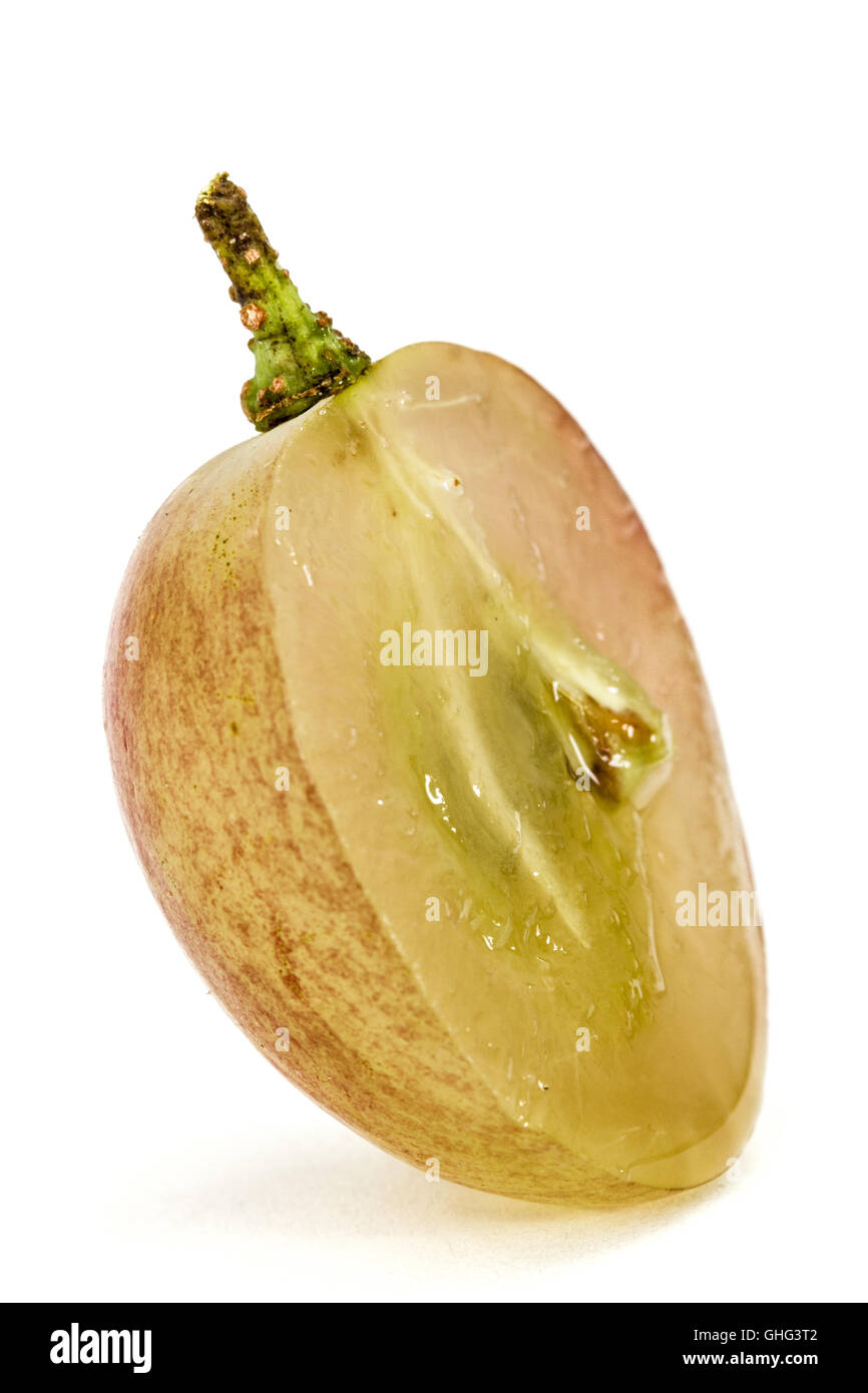 Half of the fruit of the grapes close-up, isolated on white background ...