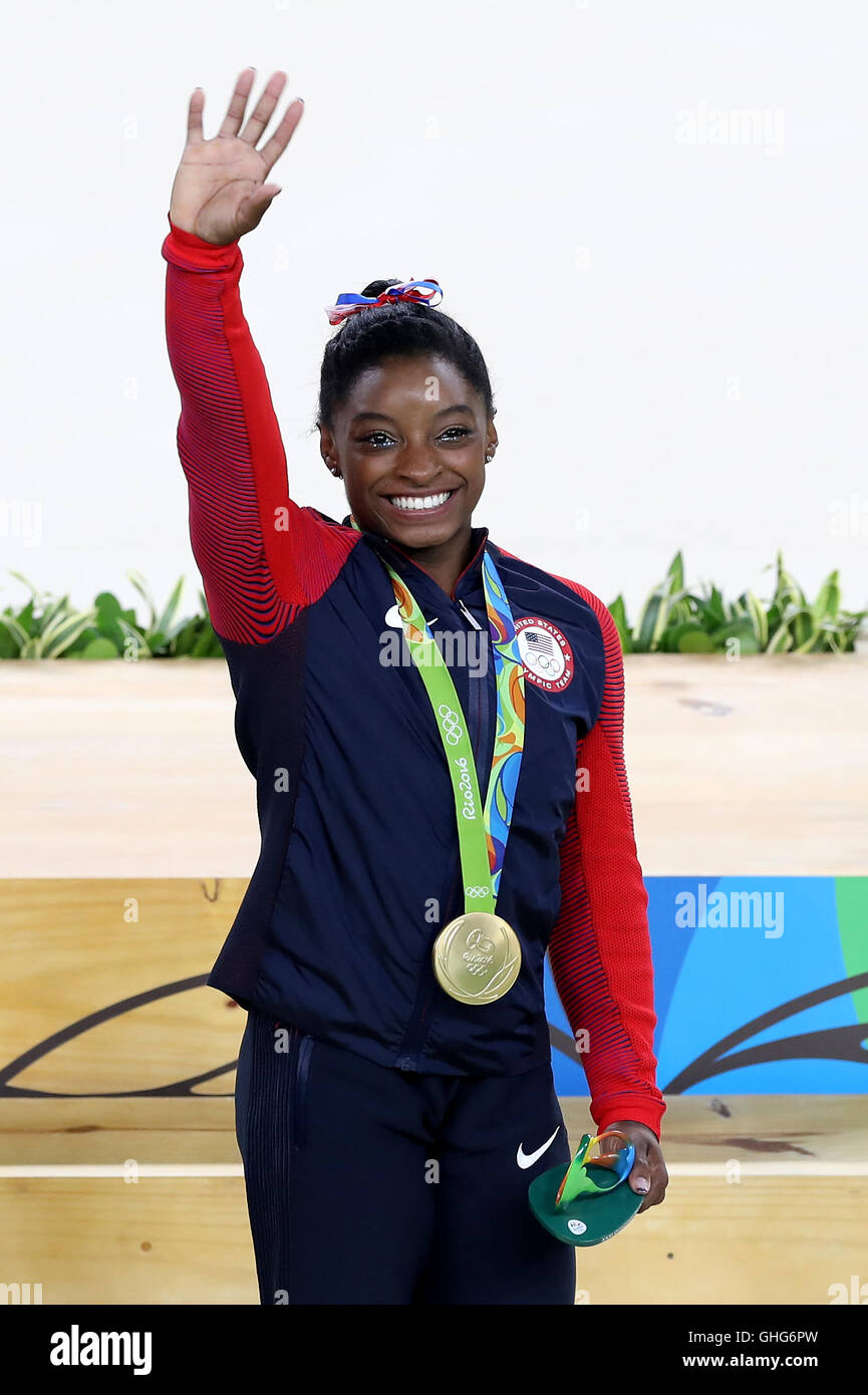 USA's Simone Biles celebrates with her gold medal after winning the ...
