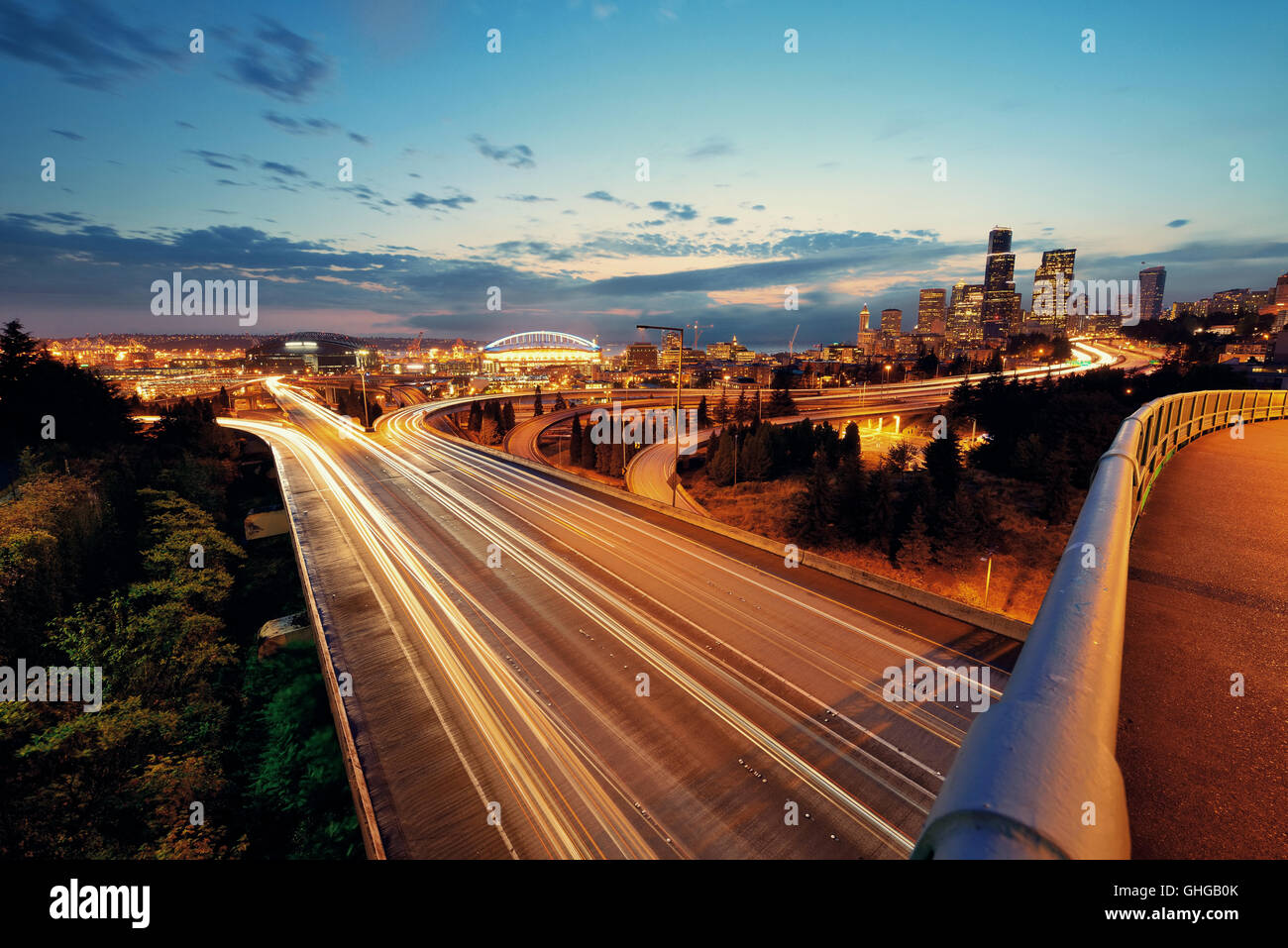 Seattle city view with urban architecture and traffic light trail at ...