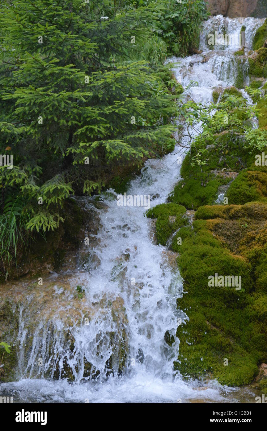 Watercourse from a waterfall Stock Photo - Alamy