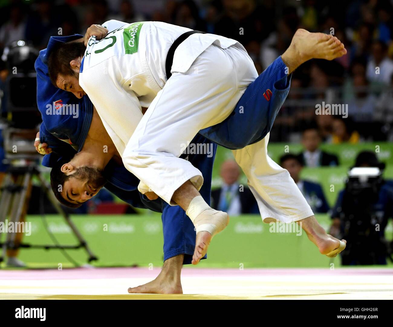 Rio De Janeiro, Brazil. 9th Aug, 2016. Khasan Khalmurzaev (bottom) of ...