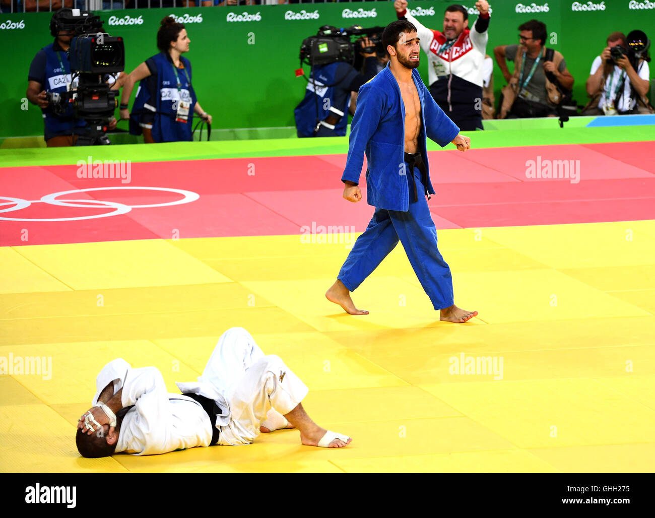 Rio De Janeiro, Brazil. 9th Aug, 2016. Khasan Khalmurzaev (R) of Russia ...