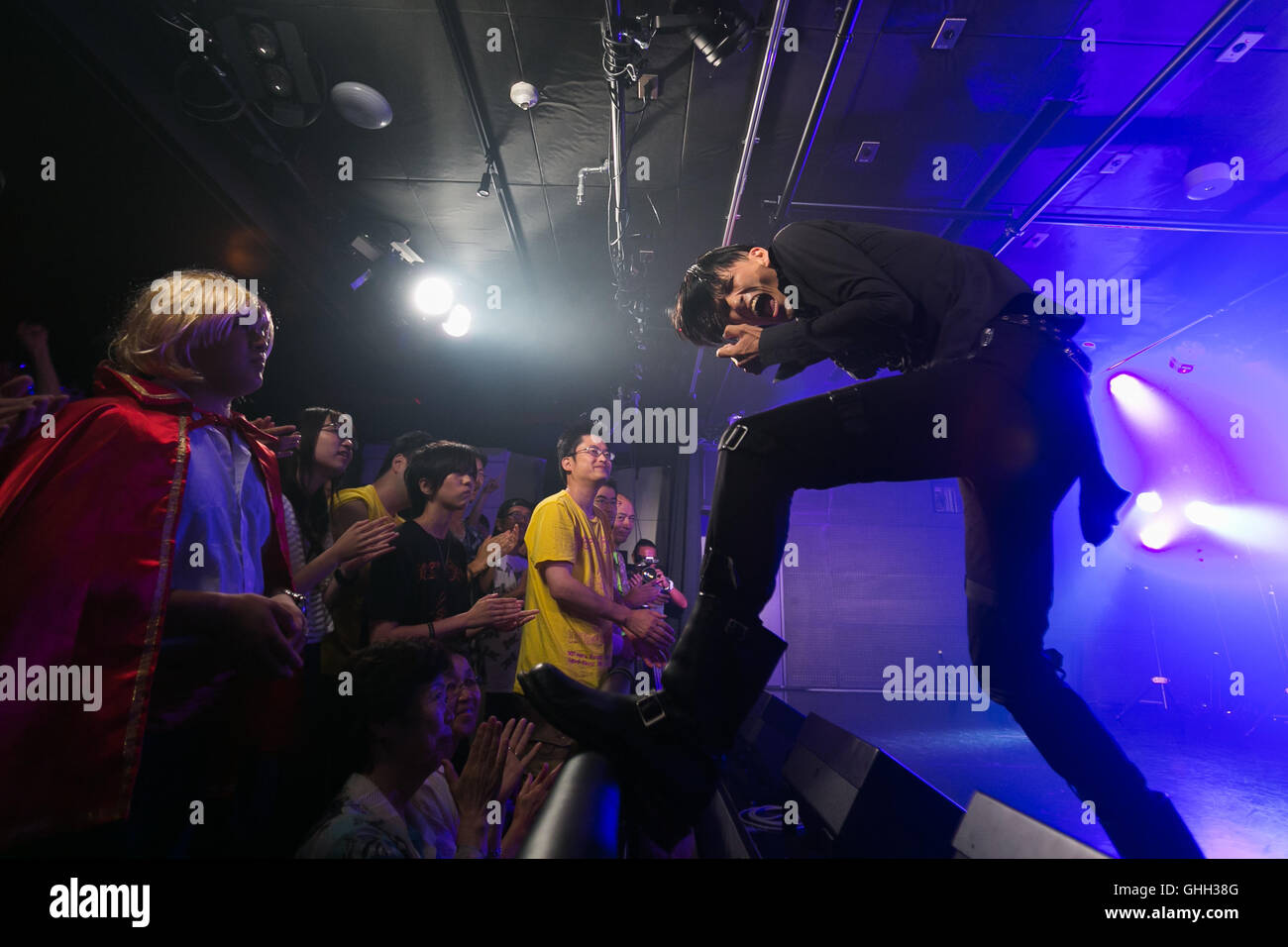 An air guitarist plays an imaginary riff during the Air Guitar 2016 ...