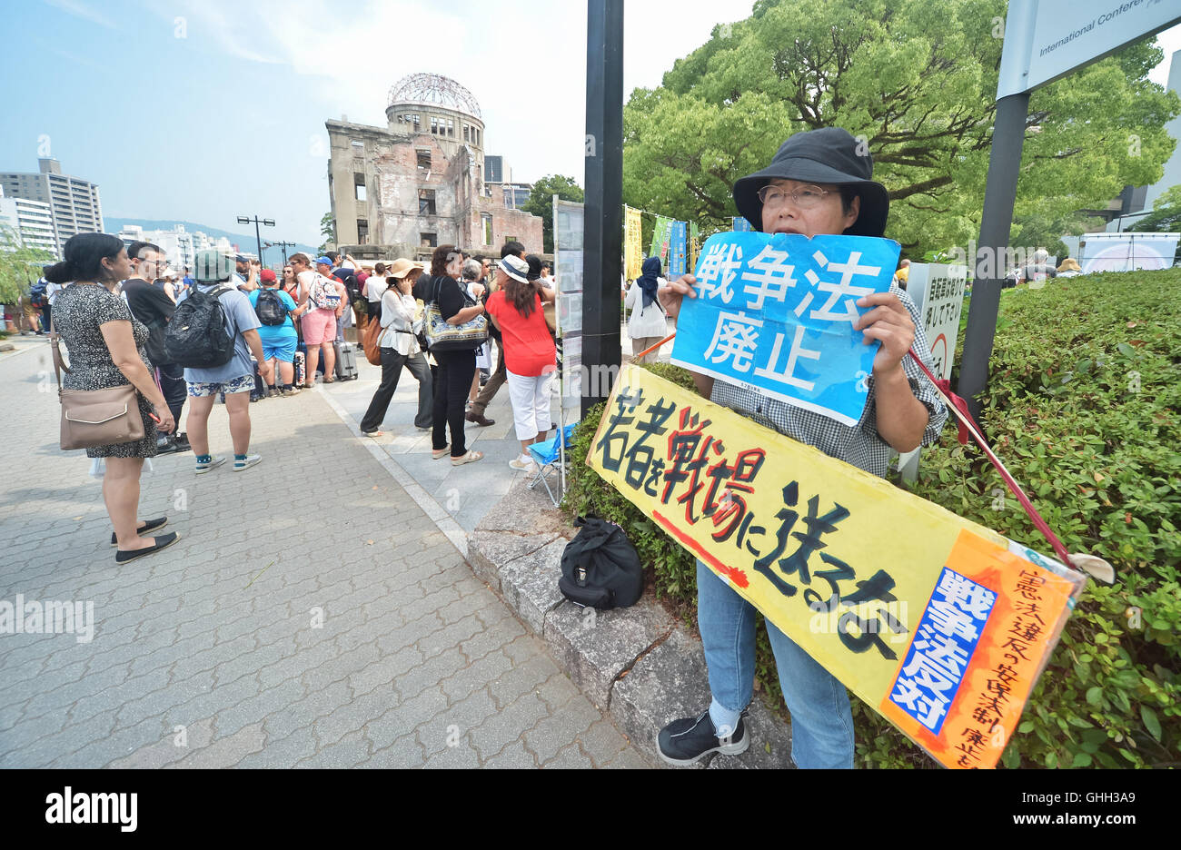 August 6, 2016, Hiroshima, Japan : Left wing activist holds up a ...