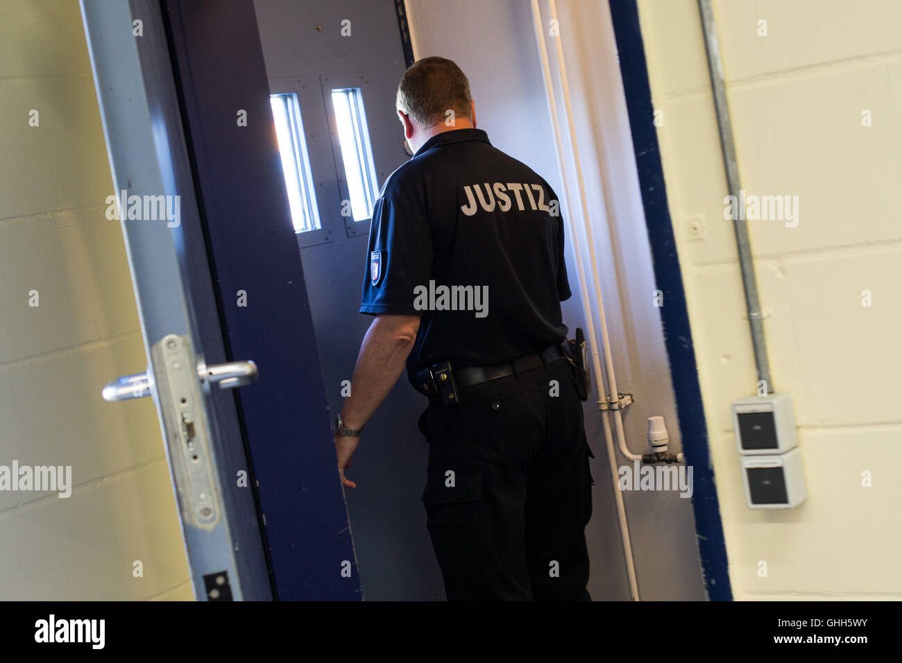 Schleswig, Germany. 13th Sep, 2016. A prison guard walks out of the ...