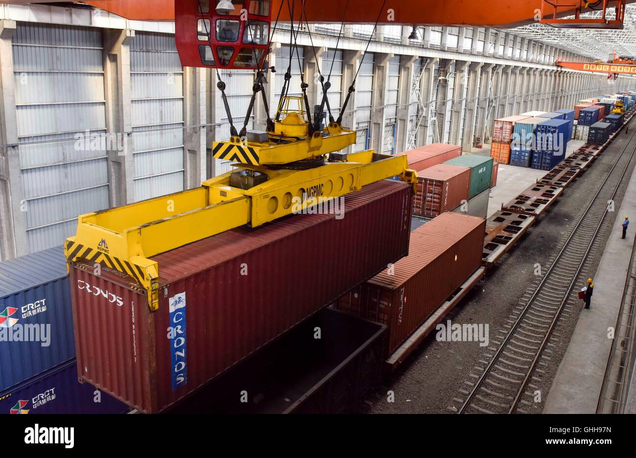 Urumqi. 28th July, 2016. A Gantry Crane transports a container onto a ...
