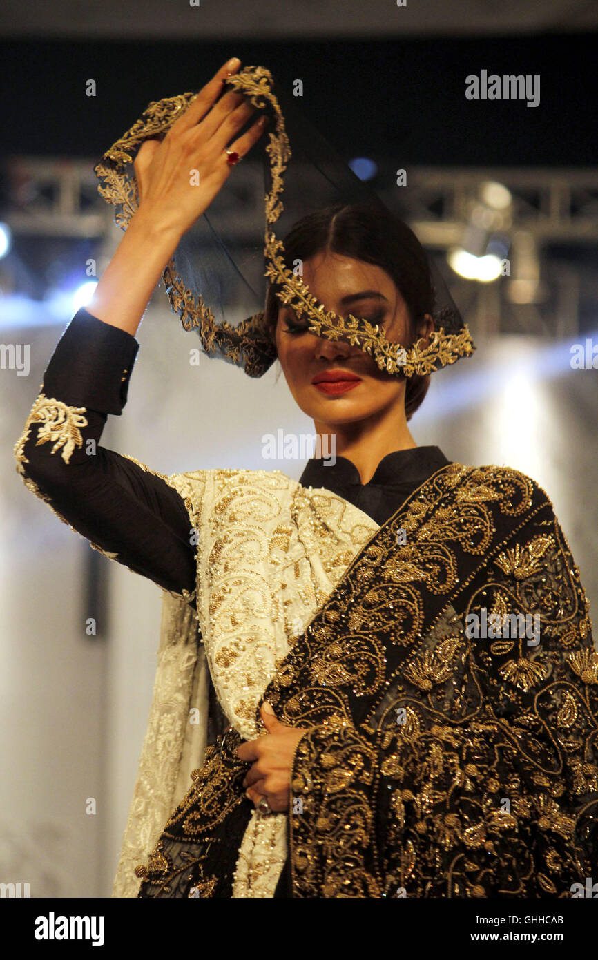 Lahore. 28th Sep, 2016. A model presents a creation of HSY collection ...