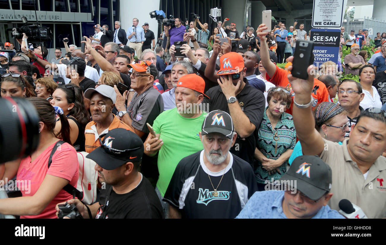 Miami, FL, USA. 28th Sep, 2016. Fans line up as the hearse arrives at ...