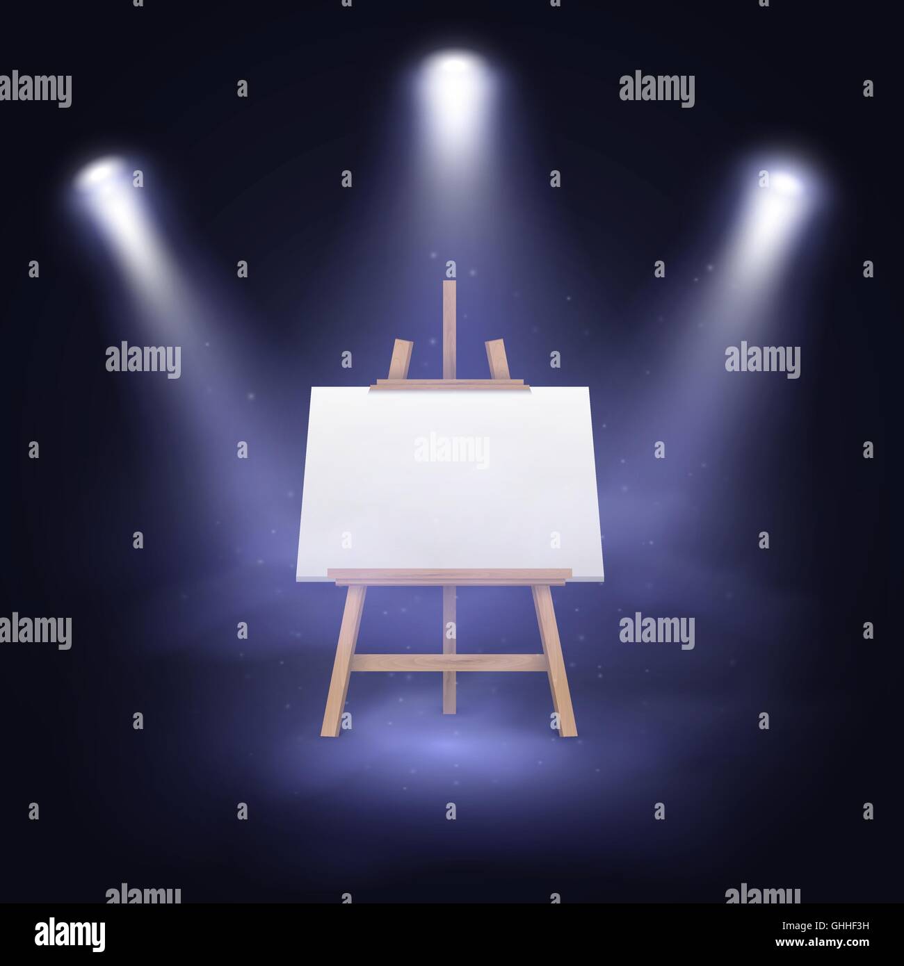 Illuminated stage with scenic lights and blank canvas on a wooden easel ...