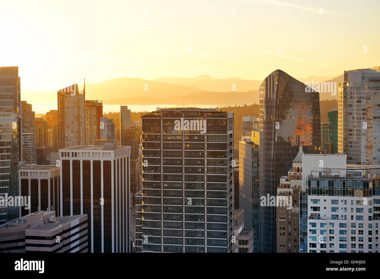 Vancouver rooftop view with urban architectures at sunset Stock Photo ...