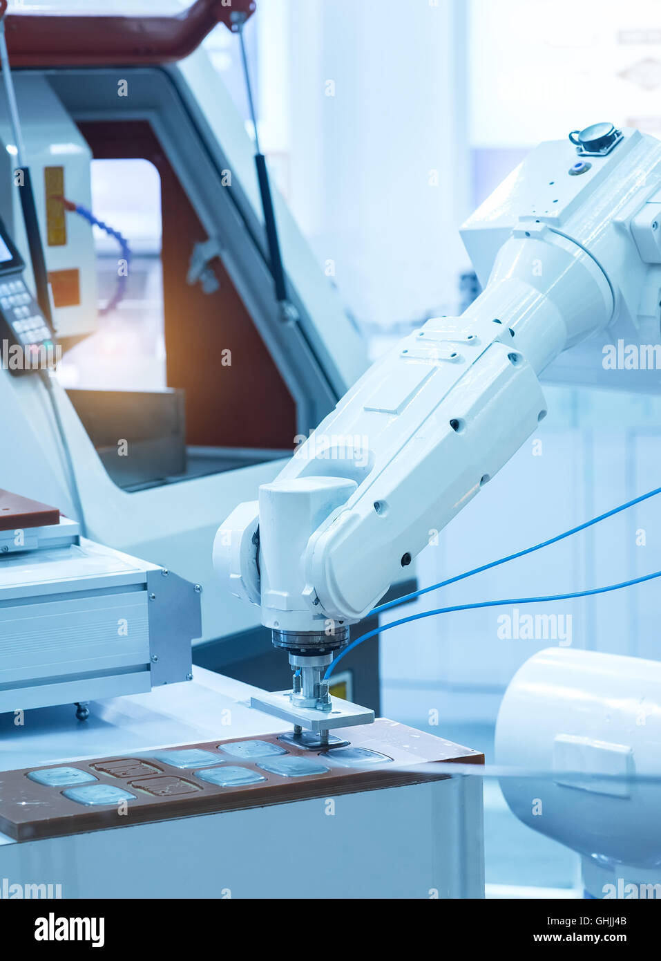 robotic hand machine tool at industrial manufacture factory Stock Photo ...