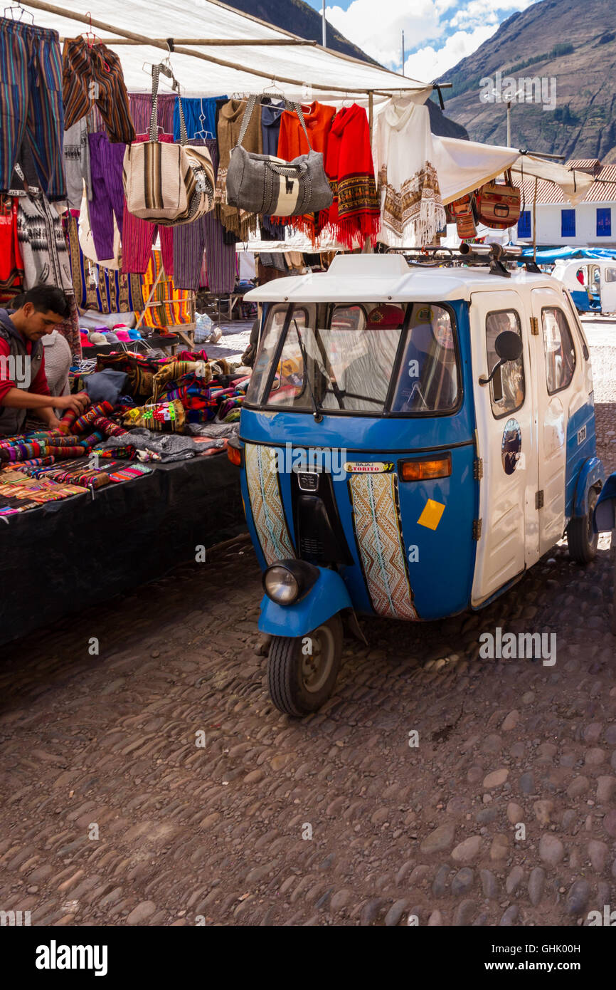 Pisac, Peru - May 15: MotoTaxi a small compact vehicle making its way ...