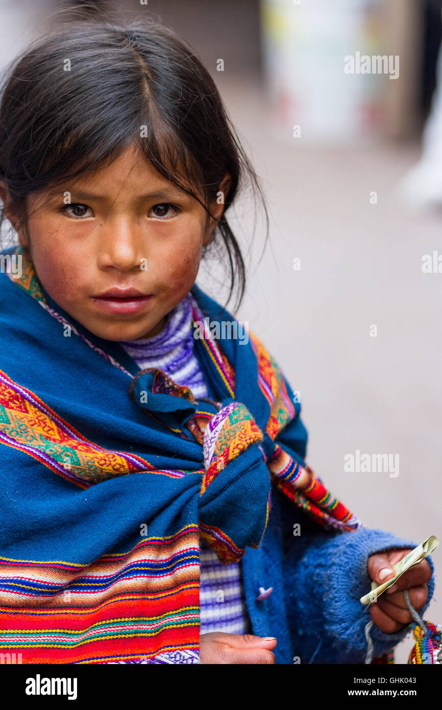 Pisac, Peru - May 15: Adorable native Quechua girl walking the ...