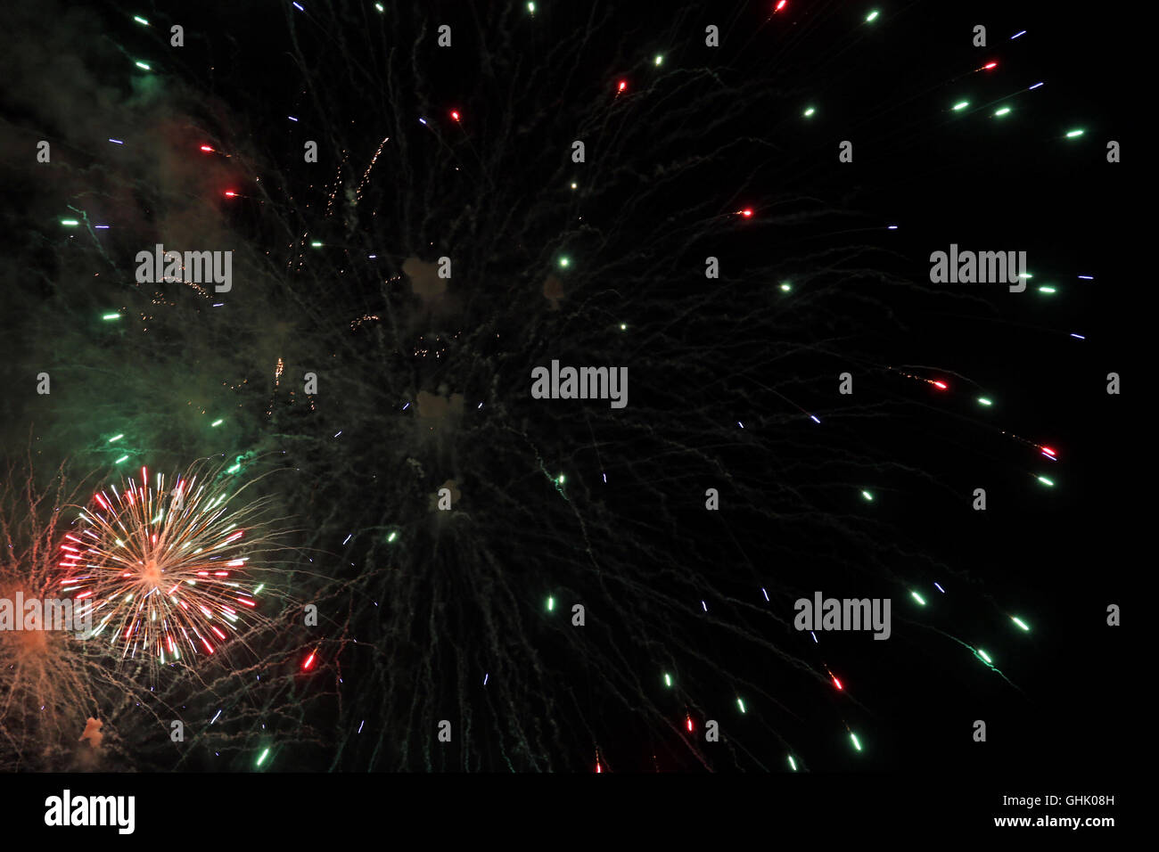 show with large colorful fireworks in the dark sky Stock Photo - Alamy