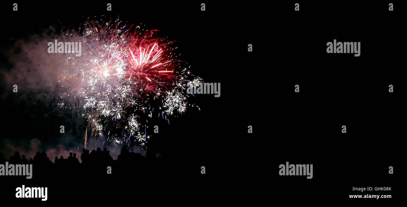 show with large colorful fireworks in the dark sky Stock Photo - Alamy