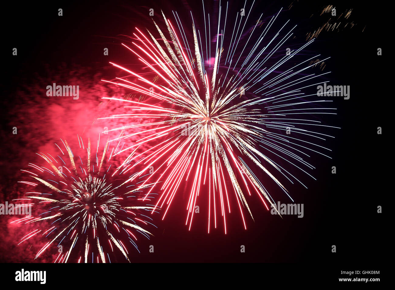 show with large colorful fireworks in the dark sky Stock Photo - Alamy