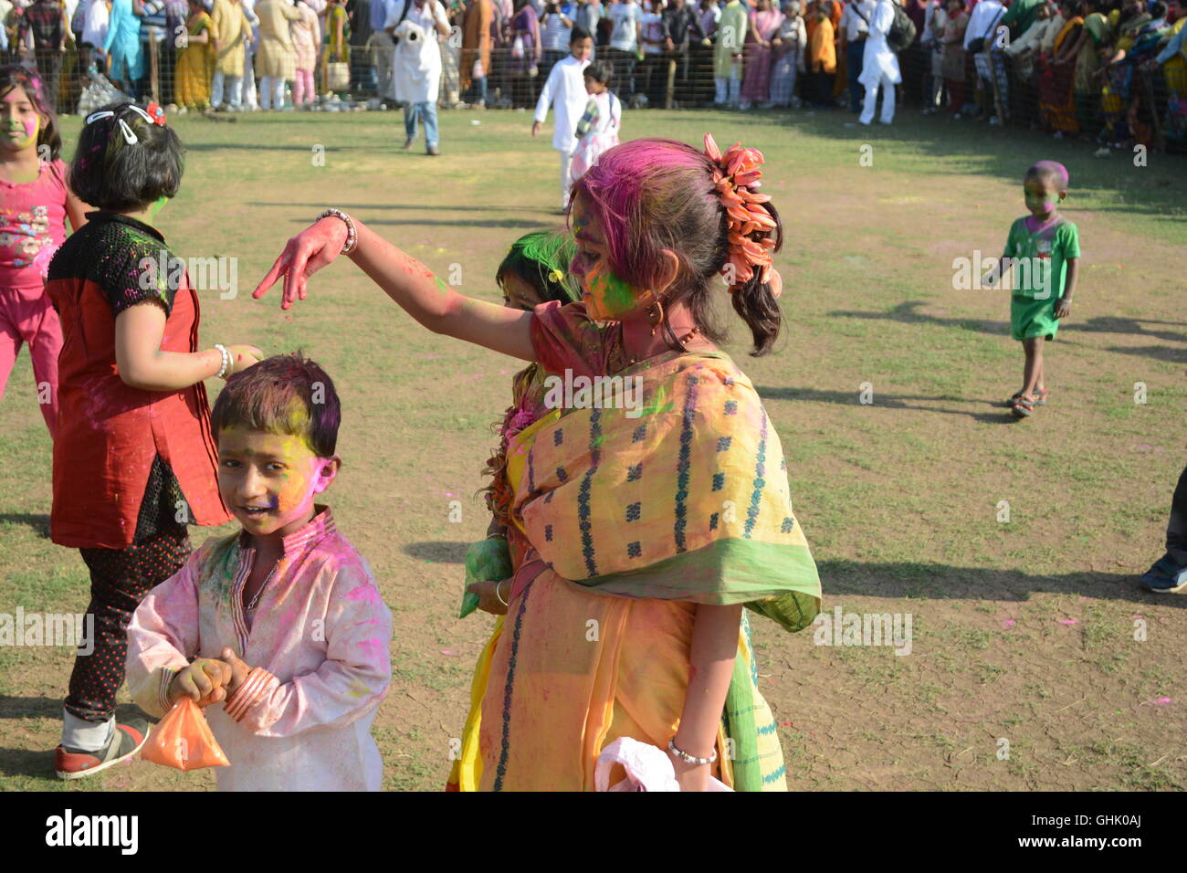Holi festival children playing enjoying hi-res stock photography and ...