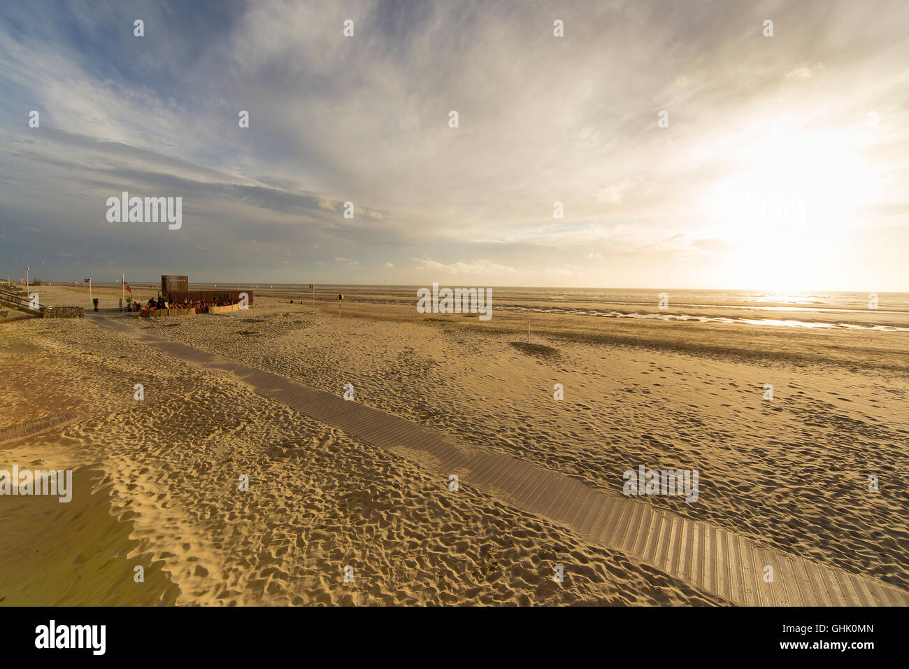 Beach bar on long sandy beach in France at sunset Stock Photo - Alamy