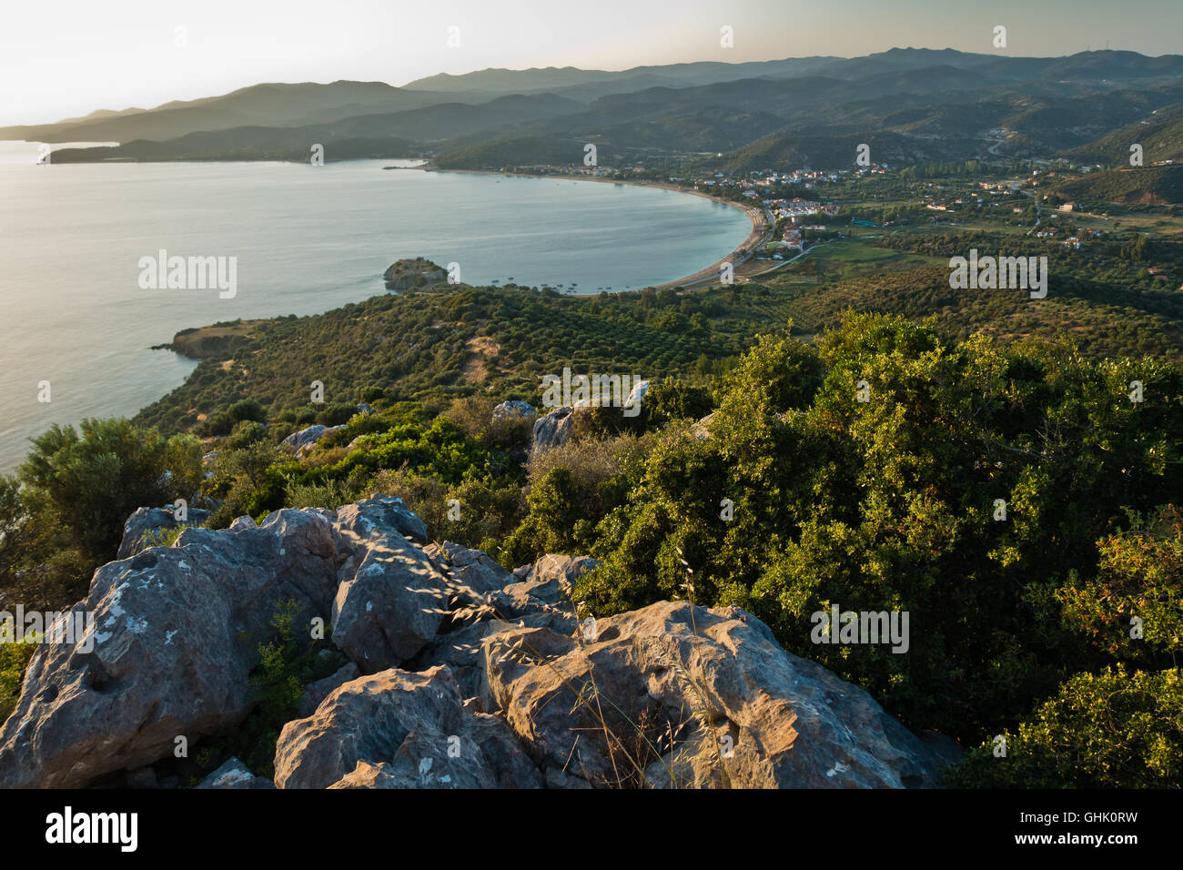 Aerial view of a beach at small greek village Toroni at sunset in ...
