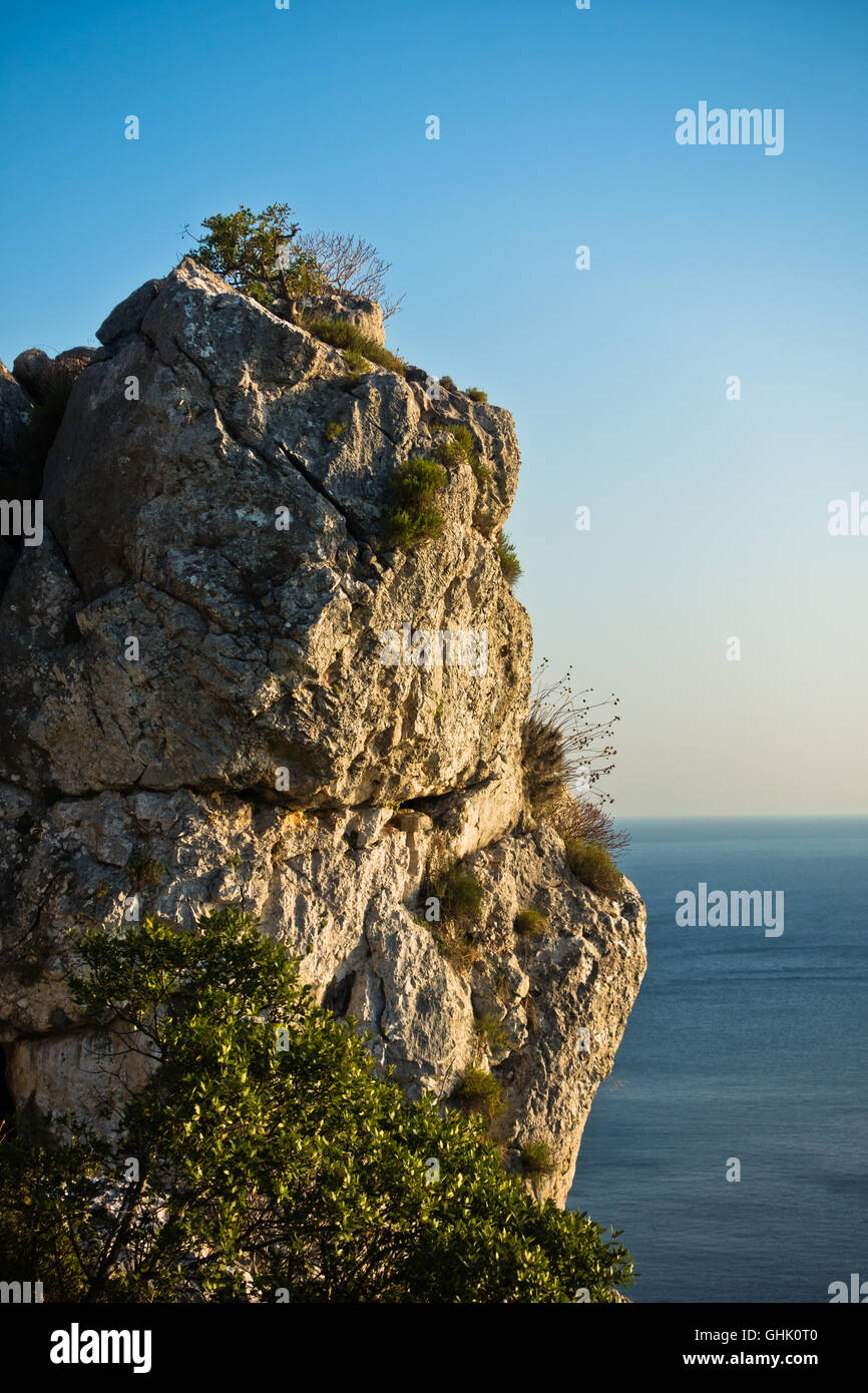 Tranquil sunset ocean cliff landscape hi-res stock photography and ...