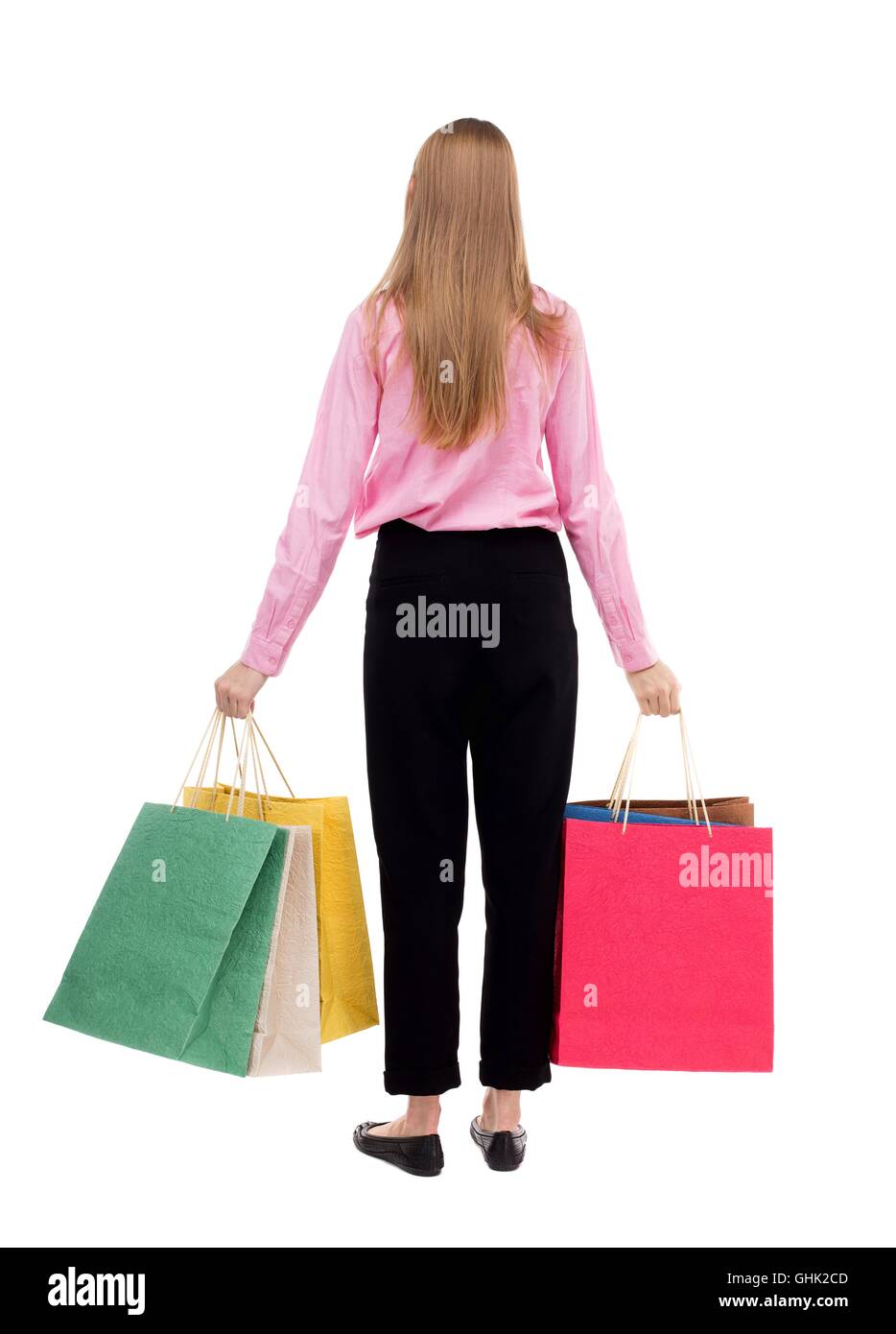 back view of woman with shopping bags Stock Photo - Alamy