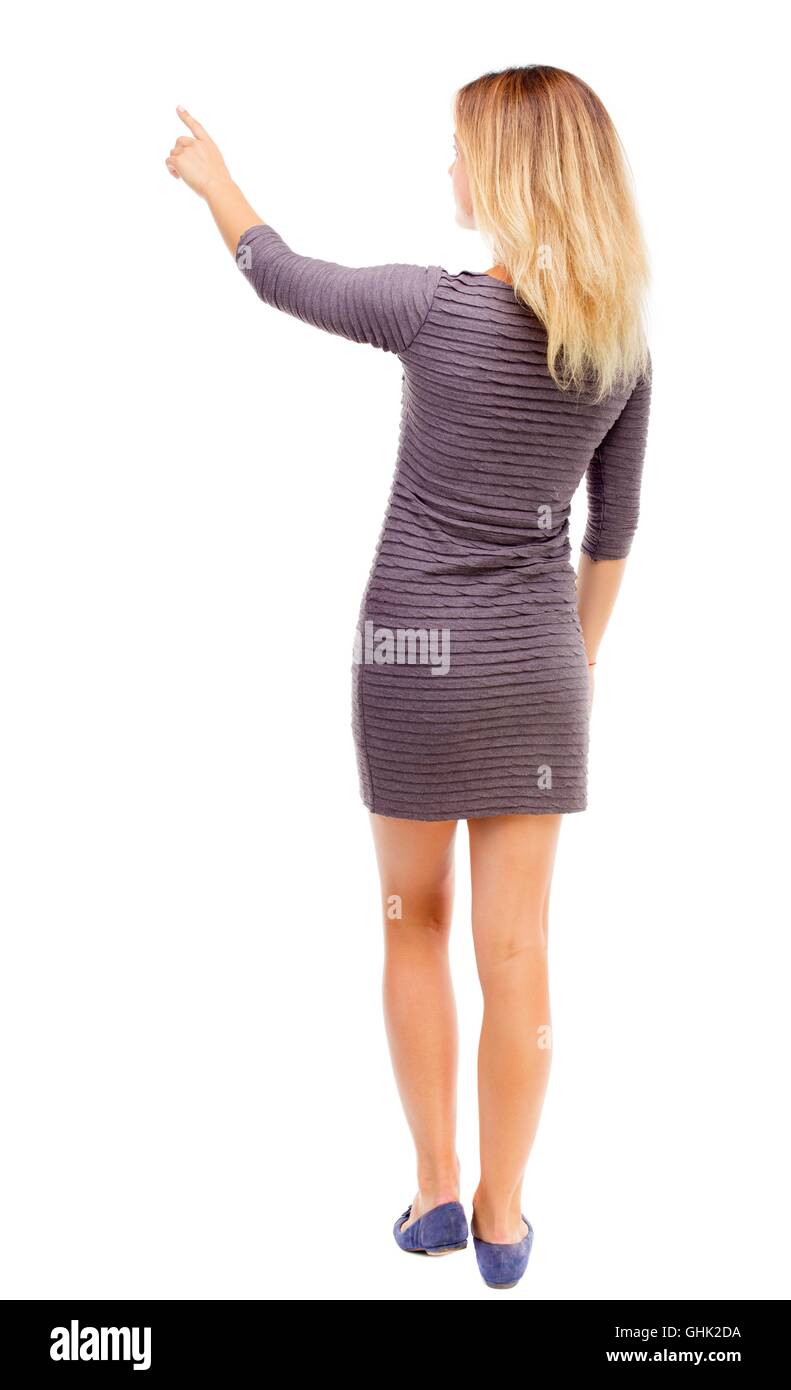Back view of pointing woman Stock Photo - Alamy
