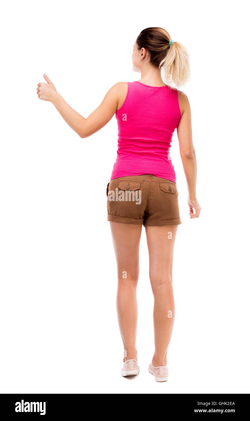 Back view of woman thumbs up Stock Photo - Alamy