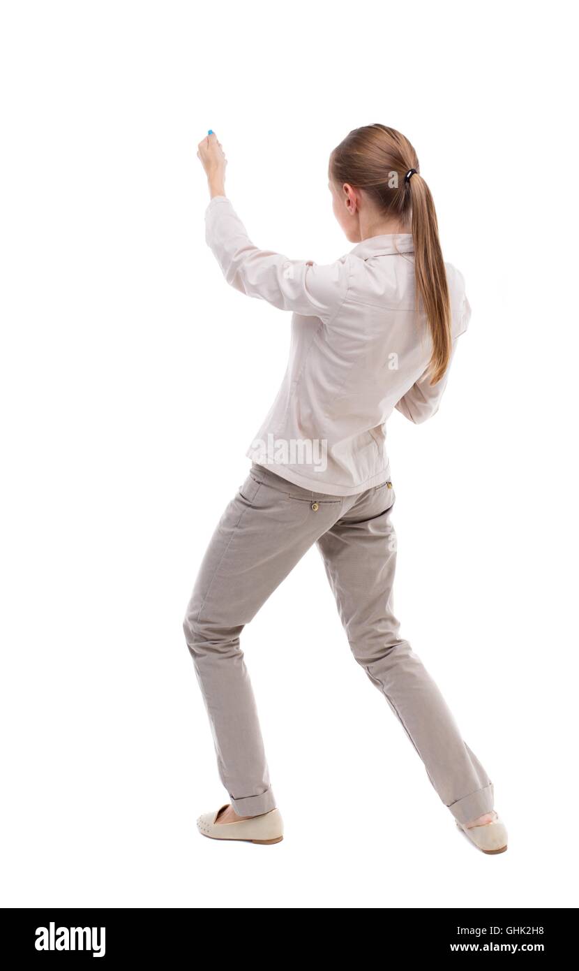 back view of standing girl pulling a rope from the top or cling Stock ...