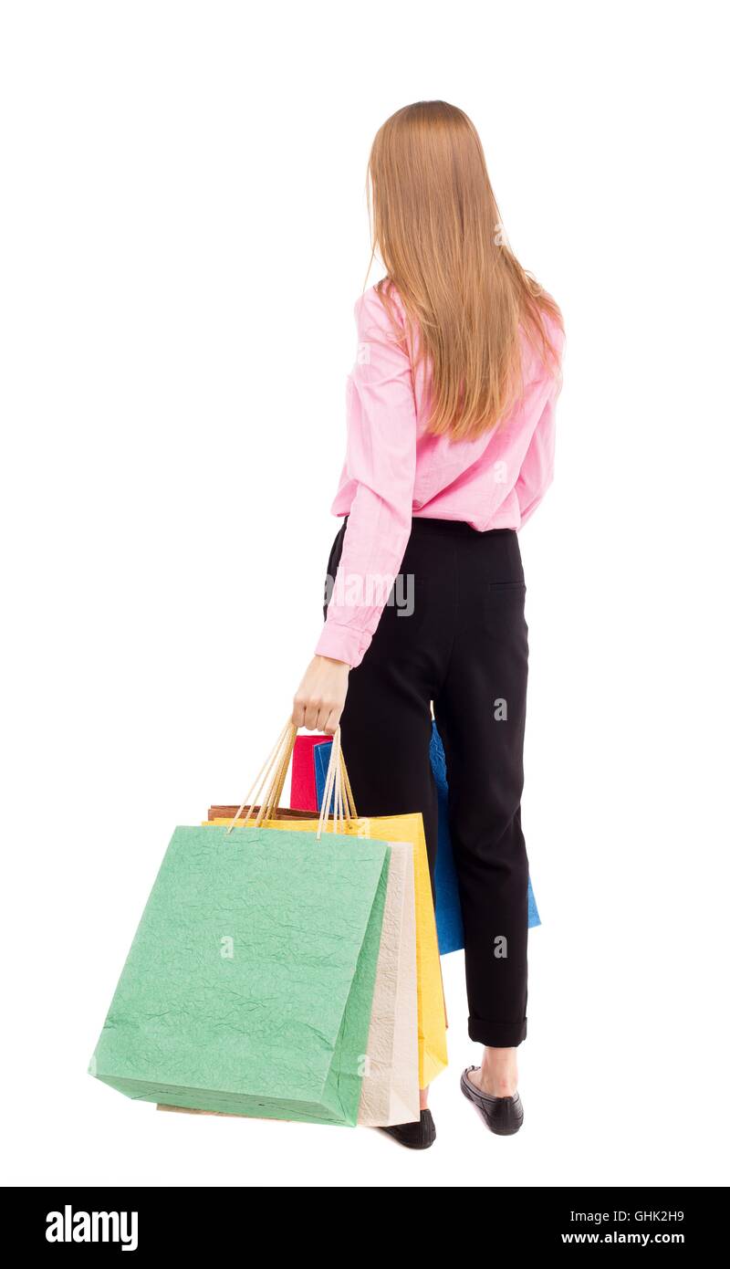 back view of woman with shopping bags Stock Photo - Alamy