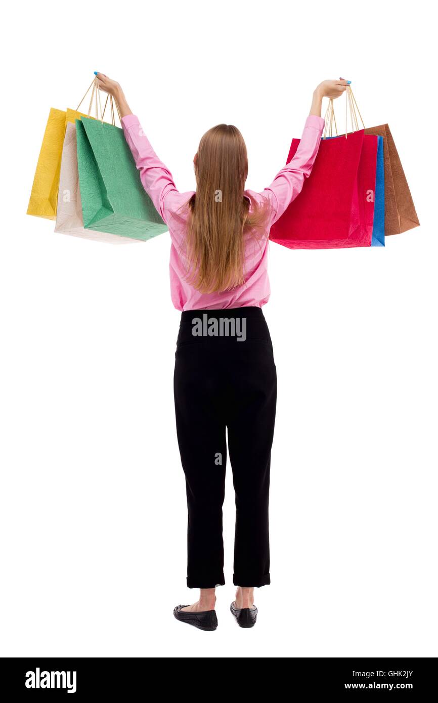 back view of woman with shopping bags Stock Photo - Alamy