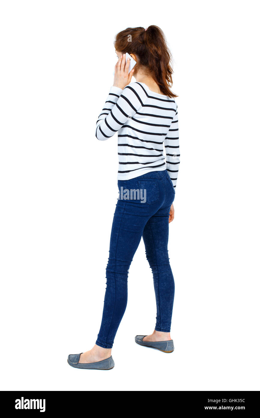 back view of a woman talking on the phone Stock Photo - Alamy