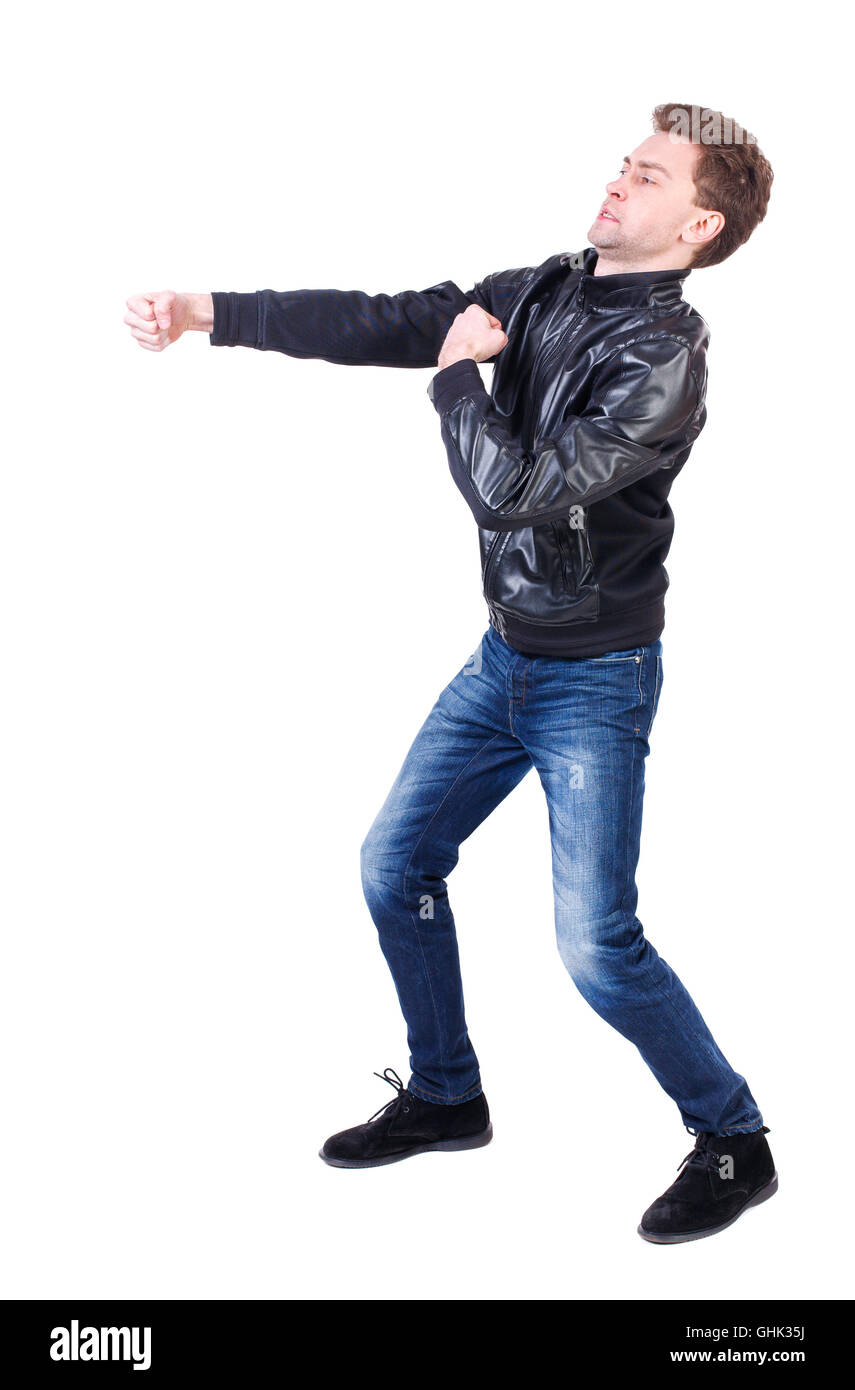 back view of guy funny fights waving his arms and legs Stock Photo - Alamy