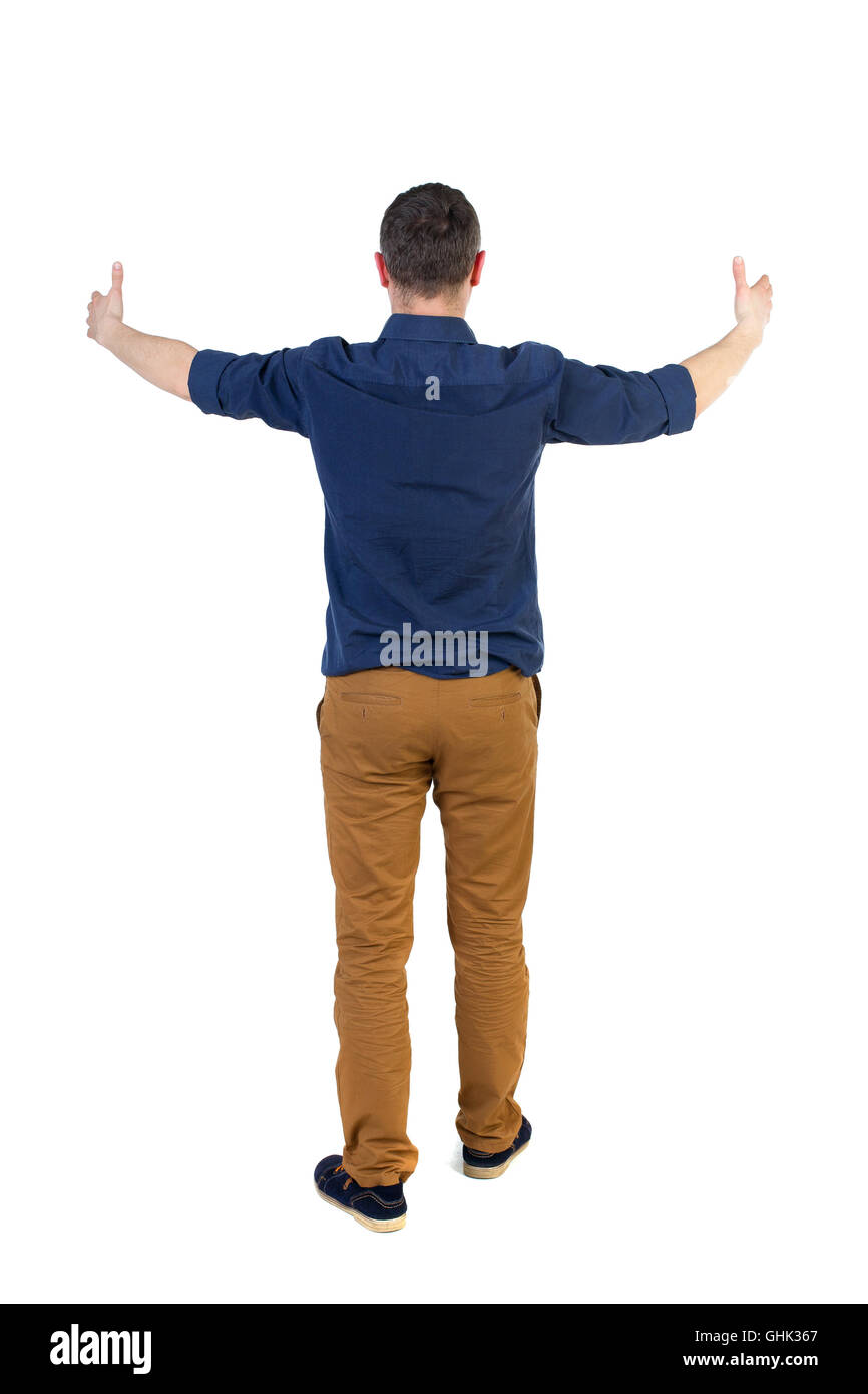 Back view of business man shows thumbs up Stock Photo - Alamy