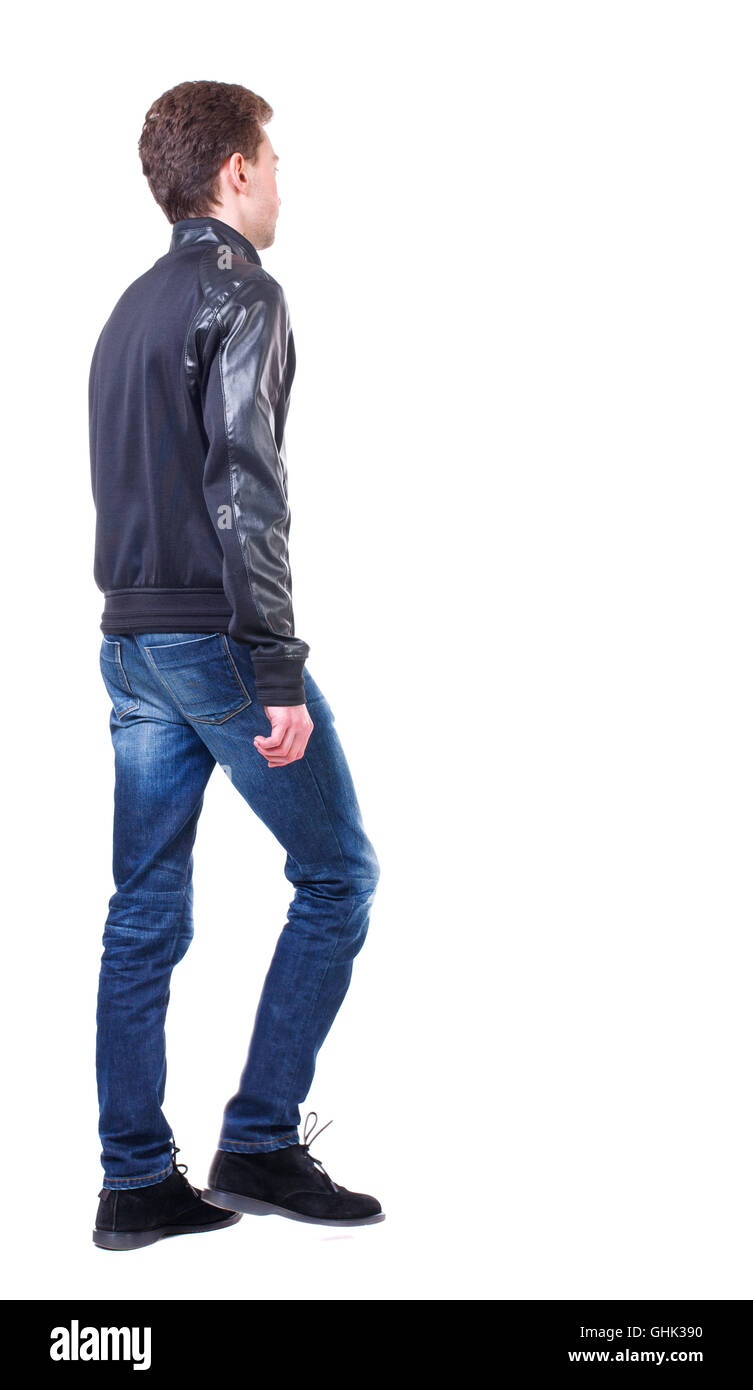 Back view of going handsome man Stock Photo - Alamy