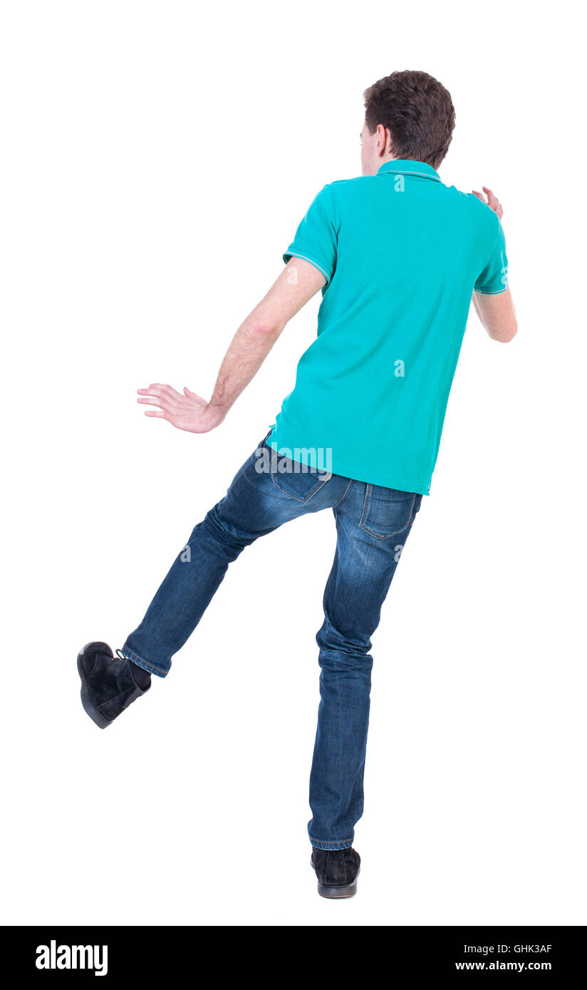 back view of dancing young man Stock Photo - Alamy