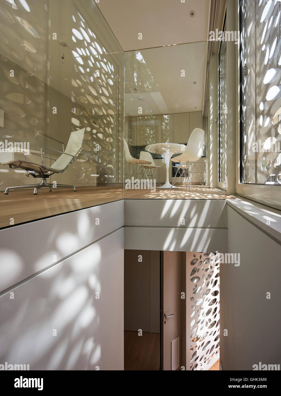 Stairway with view towards first floor and ground floor entrance. House ...