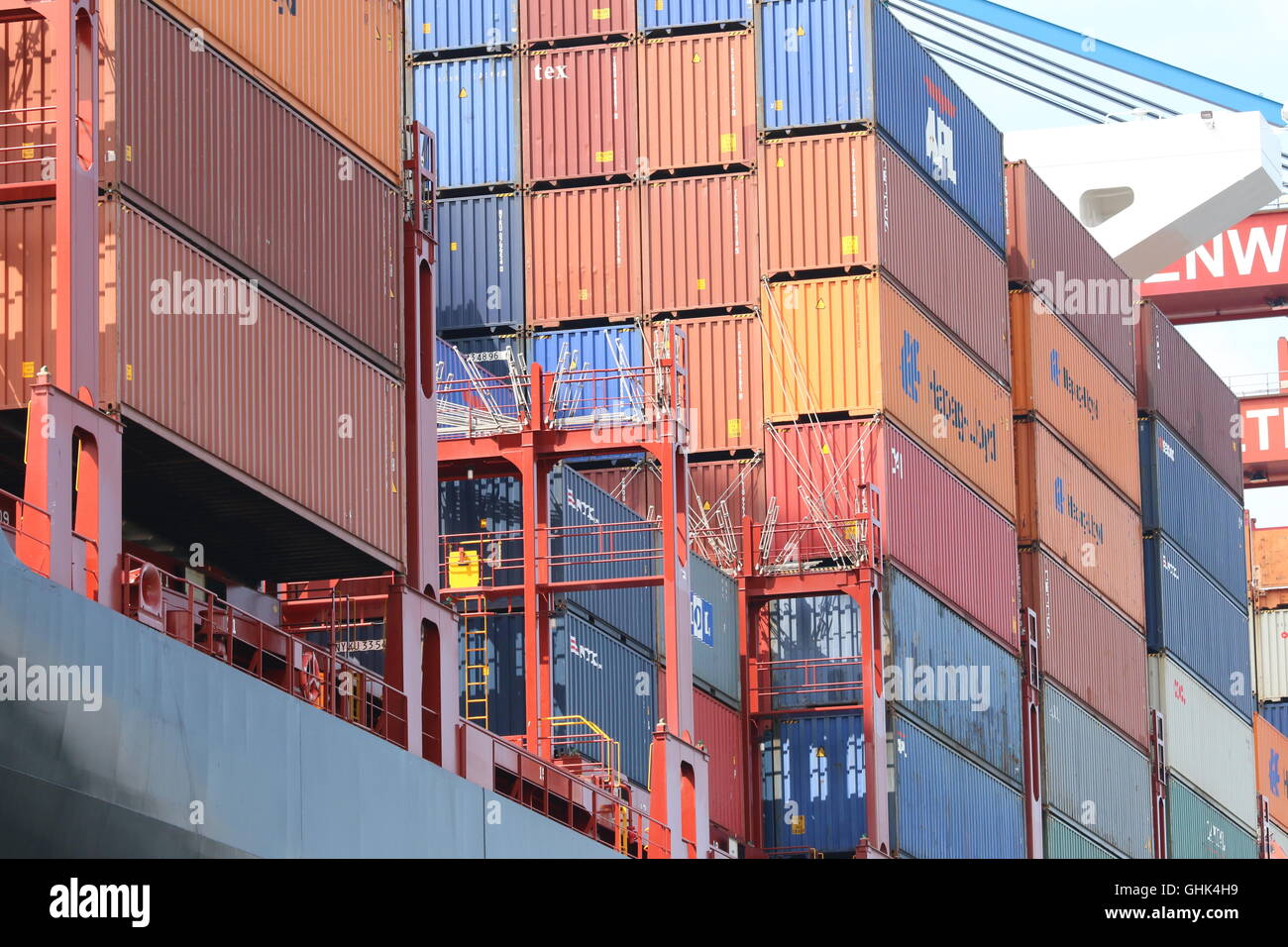 containers stacked aboard a containership Stock Photo - Alamy