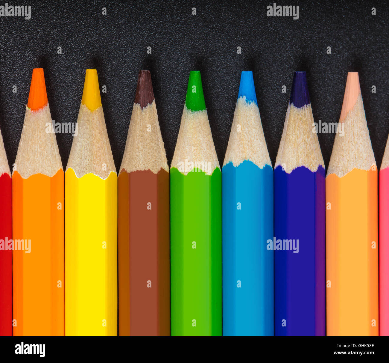 colored pencils close-up while lying in a row Stock Photo - Alamy