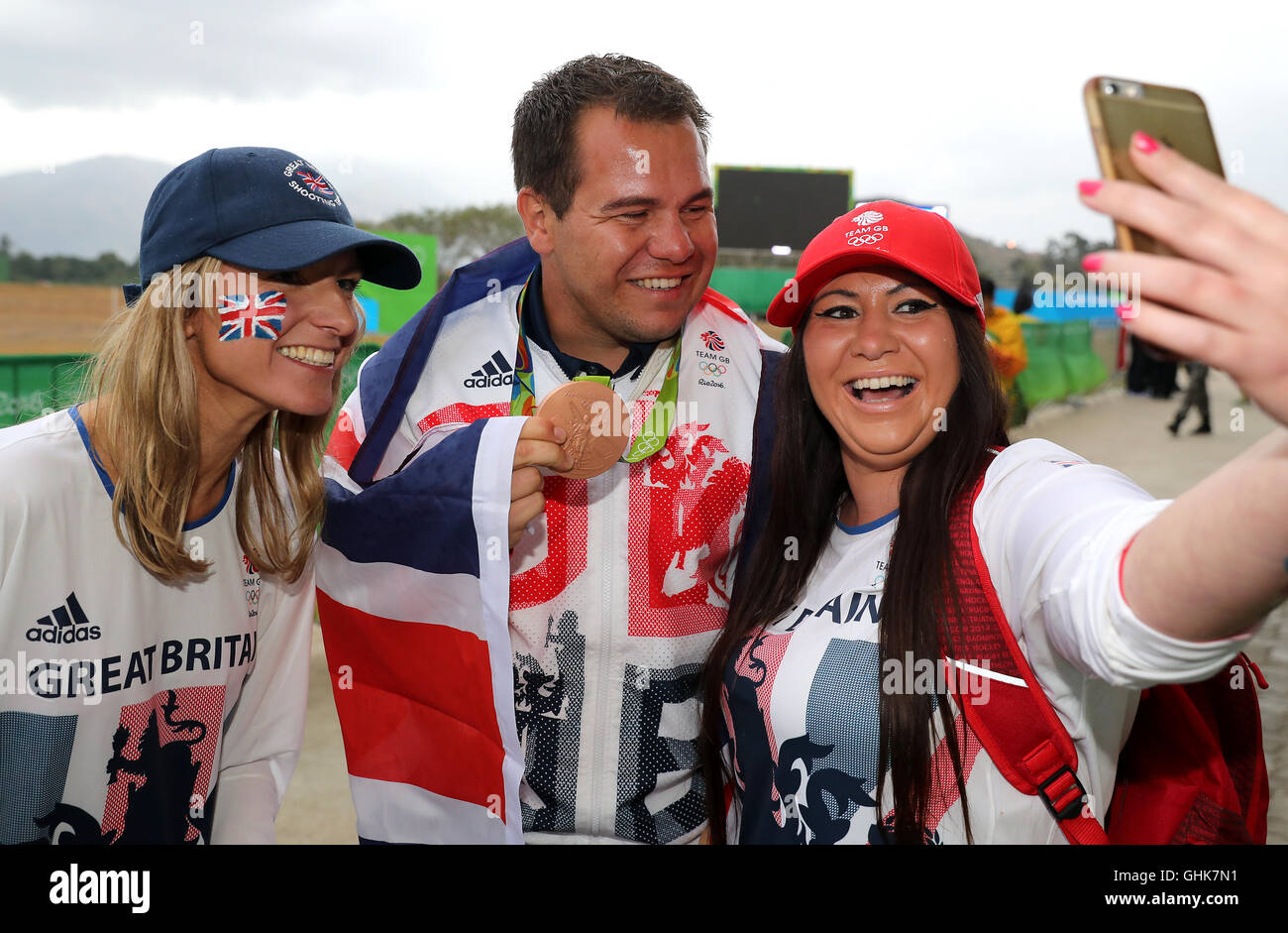 Great Britain's Steven Scott (centre) poses for a selfie taken with ...