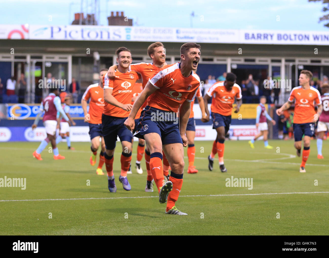 Luton Town's Jake Gray celebrates scoring his side's first goal of the ...