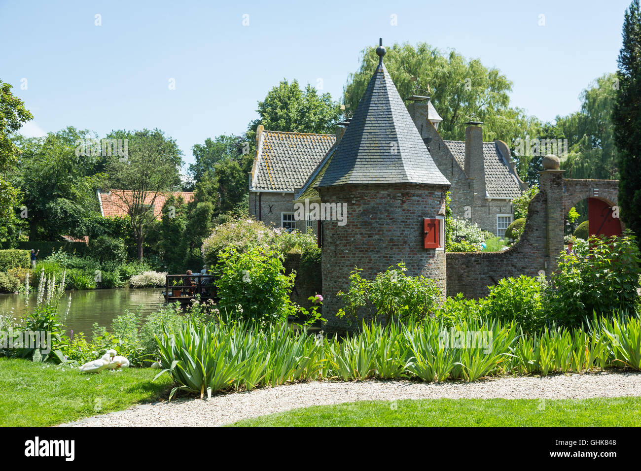 Old dutch castle with tower and moat in Baarland, The Netherlands Stock ...