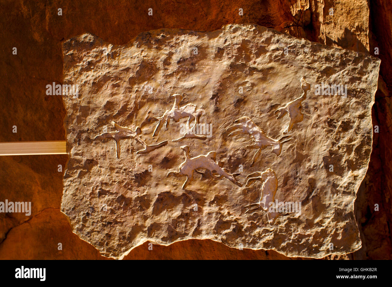Prehistoric Rock art in the desert depicting a hunting scene, 3rd ...