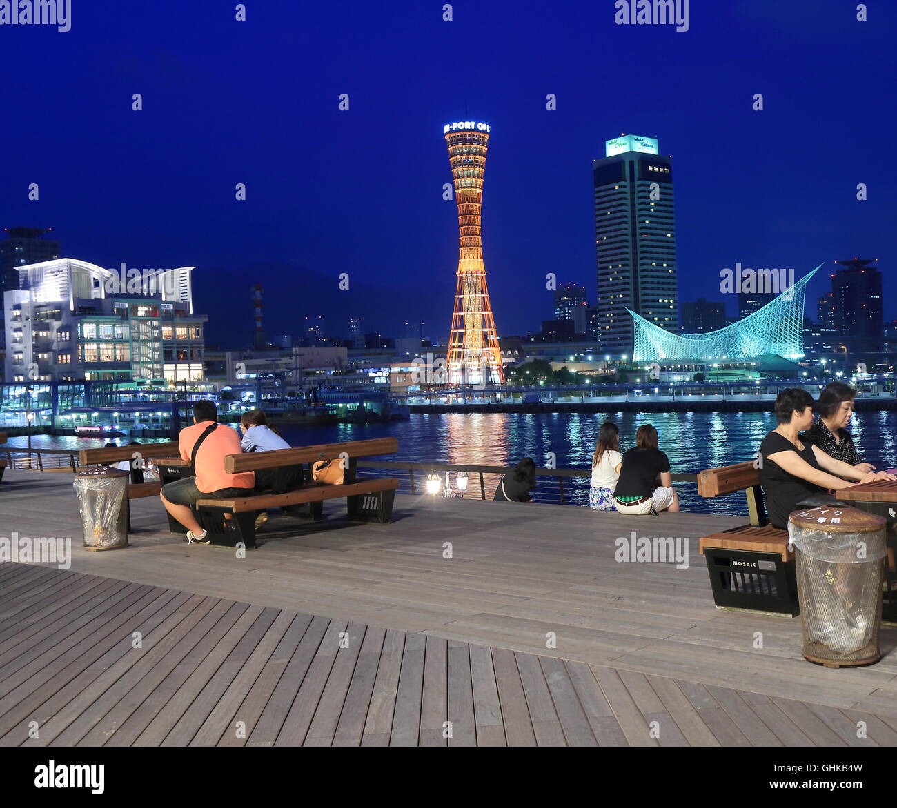 People relax at MOSAIC viewing deck in Haborland in Kobe Japan Stock ...