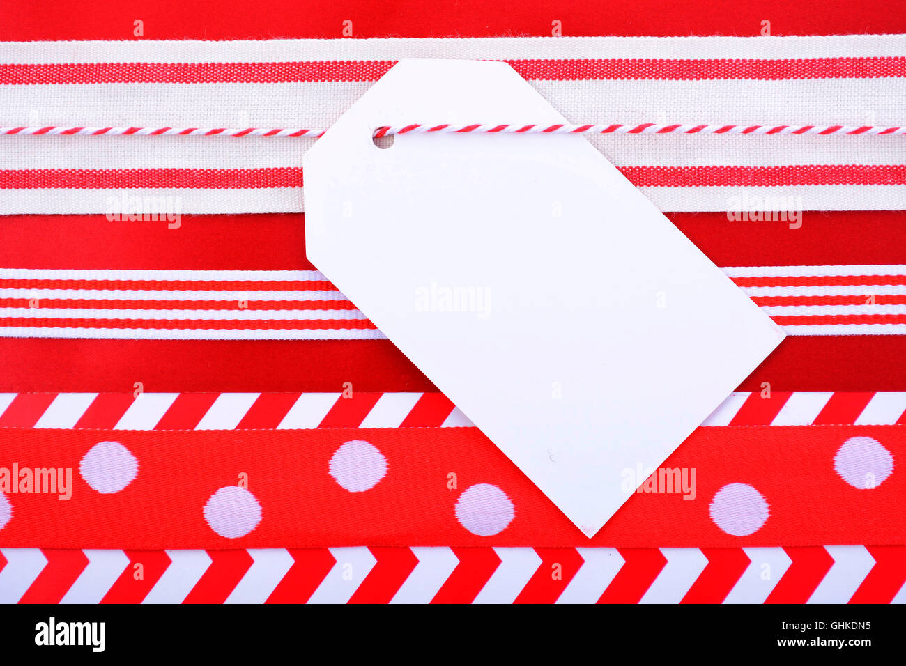 Modern holiday greeting background with close up of festive red and ...