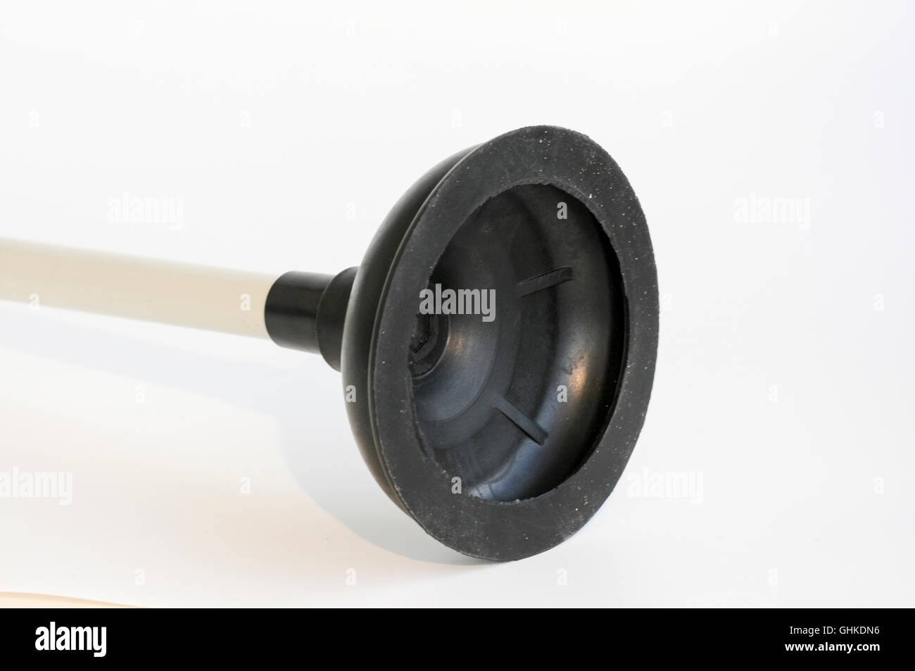 Cut of a plunger (plumber's helper or plumber's friend) on white ...
