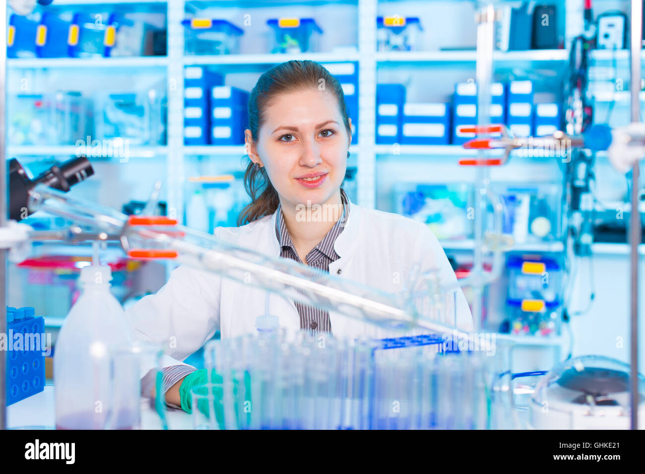 Young woman in chemical lab Stock Photo - Alamy