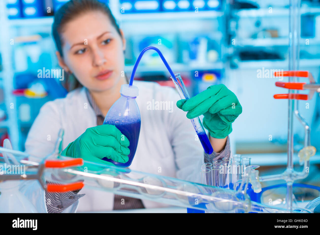 Young woman in chemical lab Stock Photo - Alamy