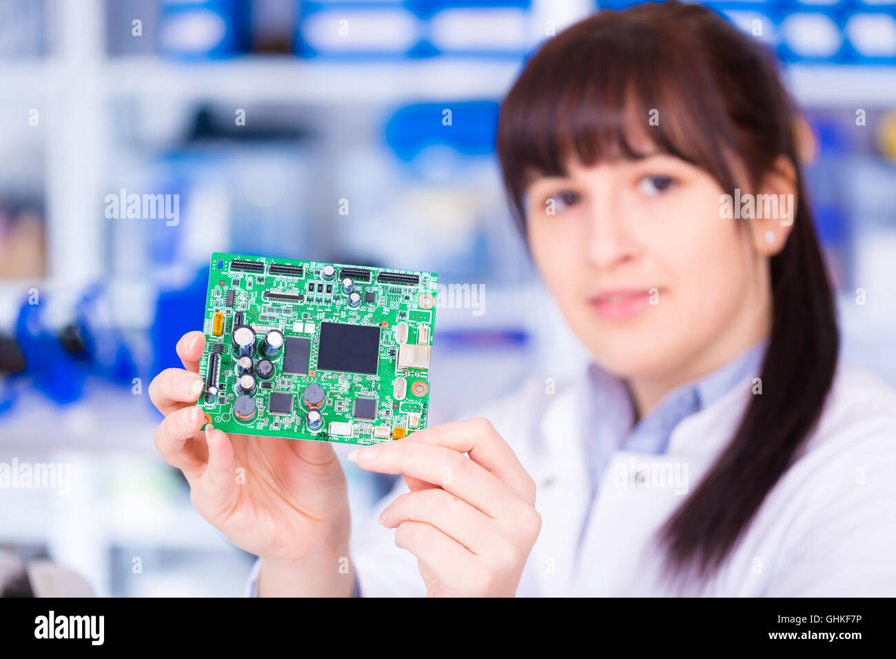 woman technician with PCB electronic plate in lab Stock Photo - Alamy