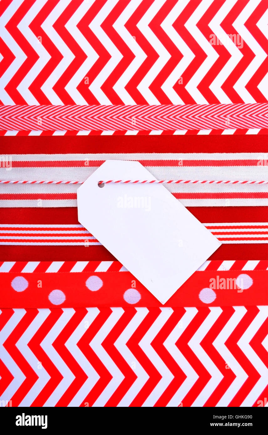 Modern holiday greeting background with close up of festive red and ...