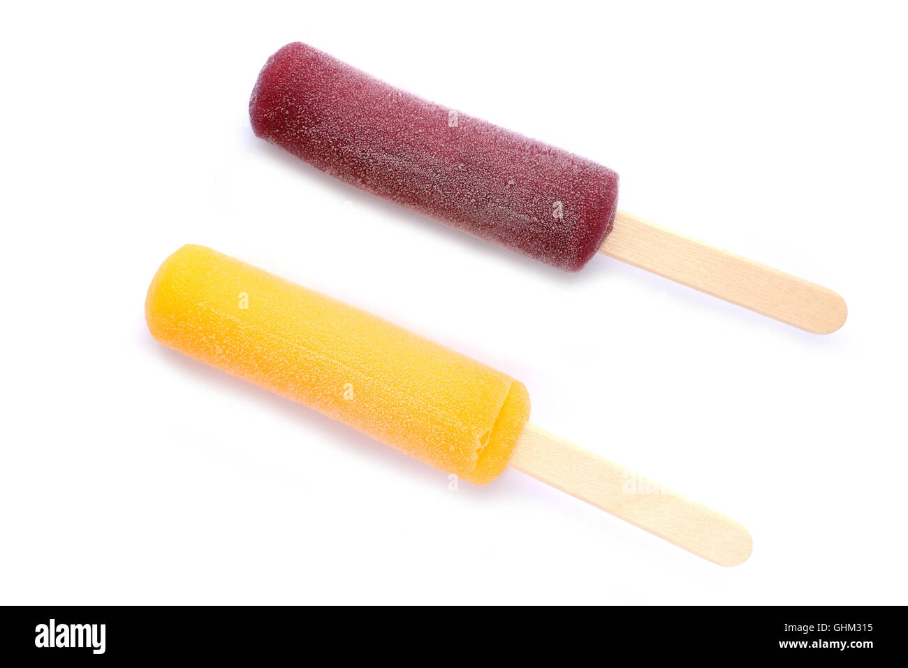 orange and grape ice candy isolated Stock Photo - Alamy